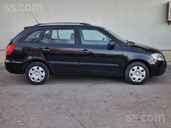 Black Skoda Fabia 2010 in Ogre, with an engine capacity of 1.40 L and mileage of 210 thousand km for 3150 €, photo 4 on AUTOMOTO.COM.LV