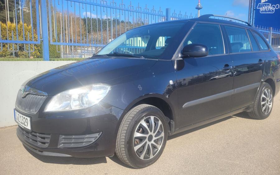 Black Skoda Fabia 2011 in Vilnius, with an engine capacity of 1.40 L and mileage of 205 thousand km for 2888 €, photo 4 on AUTOMOTO.COM.LV