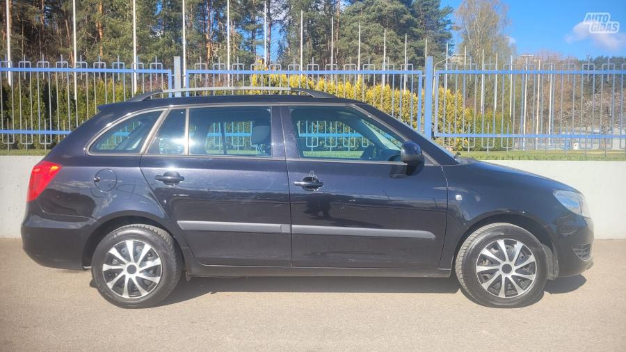 Black Skoda Fabia 2011 in Vilnius, with an engine capacity of 1.40 L and mileage of 205 thousand km for 2888 €, photo 5 on AUTOMOTO.COM.LV