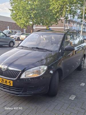 Black Skoda Fabia 2013 in Kaunas, with an engine capacity of 1.20 L and mileage of 218 thousand km for 3050 €, photo 4 on AUTOMOTO.COM.LV