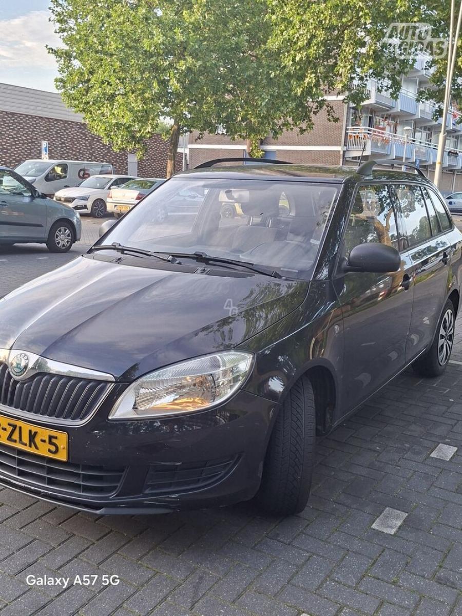 Black Skoda Fabia 2013 in Kaunas, with an engine capacity of 1.20 L and mileage of 218 thousand km for 3050 €, photo 4 on AUTOMOTO.COM.LV
