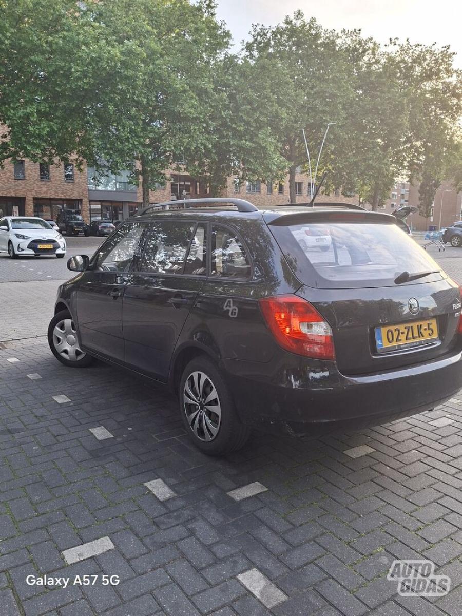 Black Skoda Fabia 2013 in Kaunas, with an engine capacity of 1.20 L and mileage of 218 thousand km for 3050 €, photo 5 on AUTOMOTO.COM.LV