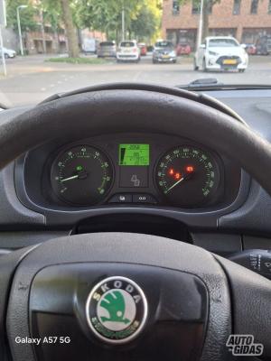 Black Skoda Fabia 2013 in Kaunas, with an engine capacity of 1.20 L and mileage of 218 thousand km for 3050 €, photo 8 on AUTOMOTO.COM.LV