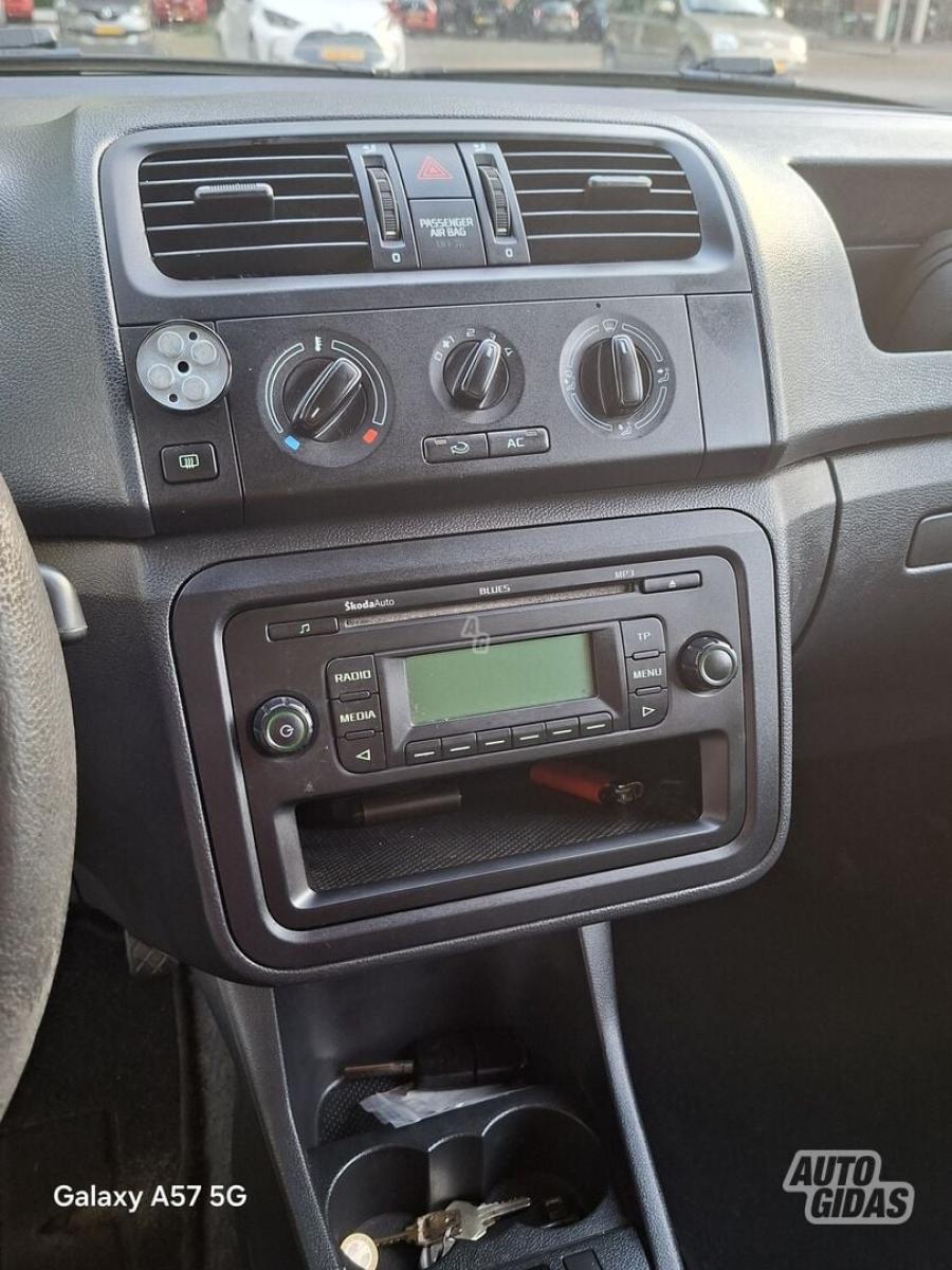Black Skoda Fabia 2013 in Kaunas, with an engine capacity of 1.20 L and mileage of 218 thousand km for 3050 €, photo 9 on AUTOMOTO.COM.LV
