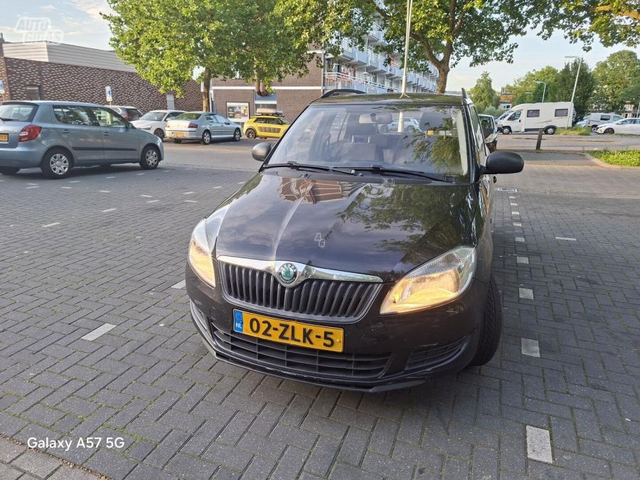 Black Skoda Fabia 2013 in Kaunas, with an engine capacity of 1.20 L and mileage of 218 thousand km for 3050 €, photo 14 on AUTOMOTO.COM.LV