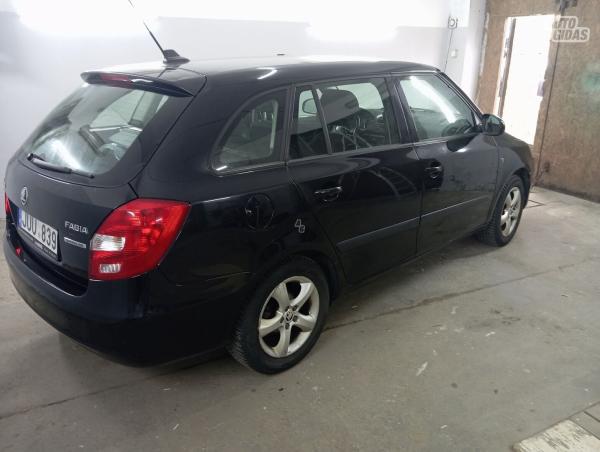 Black Skoda Fabia 2013 in Panevezys, with an engine capacity of 1.20 L and mileage of 304 thousand km for 2650 €, photo 4 on AUTOMOTO.COM.LV