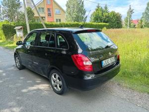 Black Skoda Fabia 2013 in Panevezys, with an engine capacity of 1.20 L and mileage of 304 thousand km for 2650 €, photo 11 on AUTOMOTO.COM.LV