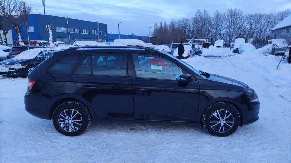Black Skoda Fabia 2015 in Klaipeda, with an engine capacity of 1.42 L and mileage of 232 thousand km for 5150 €, photo 7 on AUTOMOTO.COM.LV