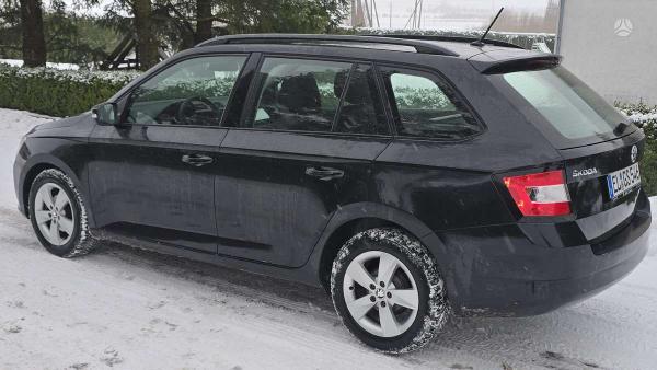 Black Skoda Fabia 2016 in Raseiniai, with an engine capacity of 1.42 L and mileage of 156 thousand km for 5990 €, photo 6 on AUTOMOTO.COM.LV