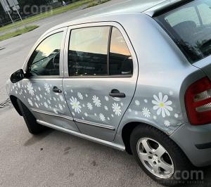 Zils Skoda Fabia 2004 Rīga, ar dzinēja tilpumu 1.40 L un nobraukumu 170 tūkst. km par 850 €, foto 16 vietnē AUTOMOTO.COM.LV