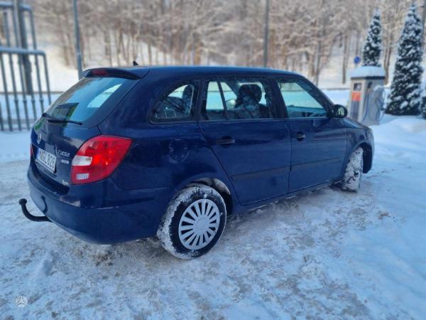 Blue Skoda Fabia 2012 in Kaunas, with an engine capacity of 1.60 L and mileage of 240 thousand km for 2150 €, photo 4 on AUTOMOTO.COM.LV