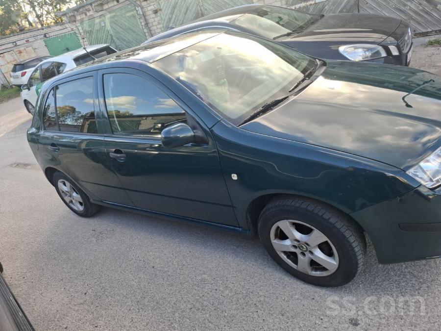 Zaļš Skoda Fabia 2005 Rīga, ar dzinēja tilpumu 1.20 L un nobraukumu 186 tūkst. km par 1470 €, foto 14 vietnē AUTOMOTO.COM.LV