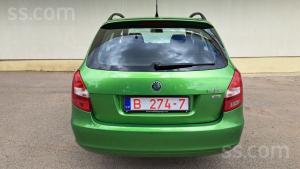 Green Skoda Fabia 2011 in Ogre, with an engine capacity of 1.40 L and mileage of 243 thousand km for 3750 €, photo 8 on AUTOMOTO.COM.LV