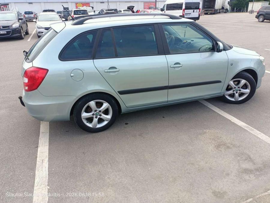 Green Skoda Fabia 2011 in Siauliai, with an engine capacity of 1.20 L and mileage of 254 thousand km for 3350 €, photo 11 on AUTOMOTO.COM.LV