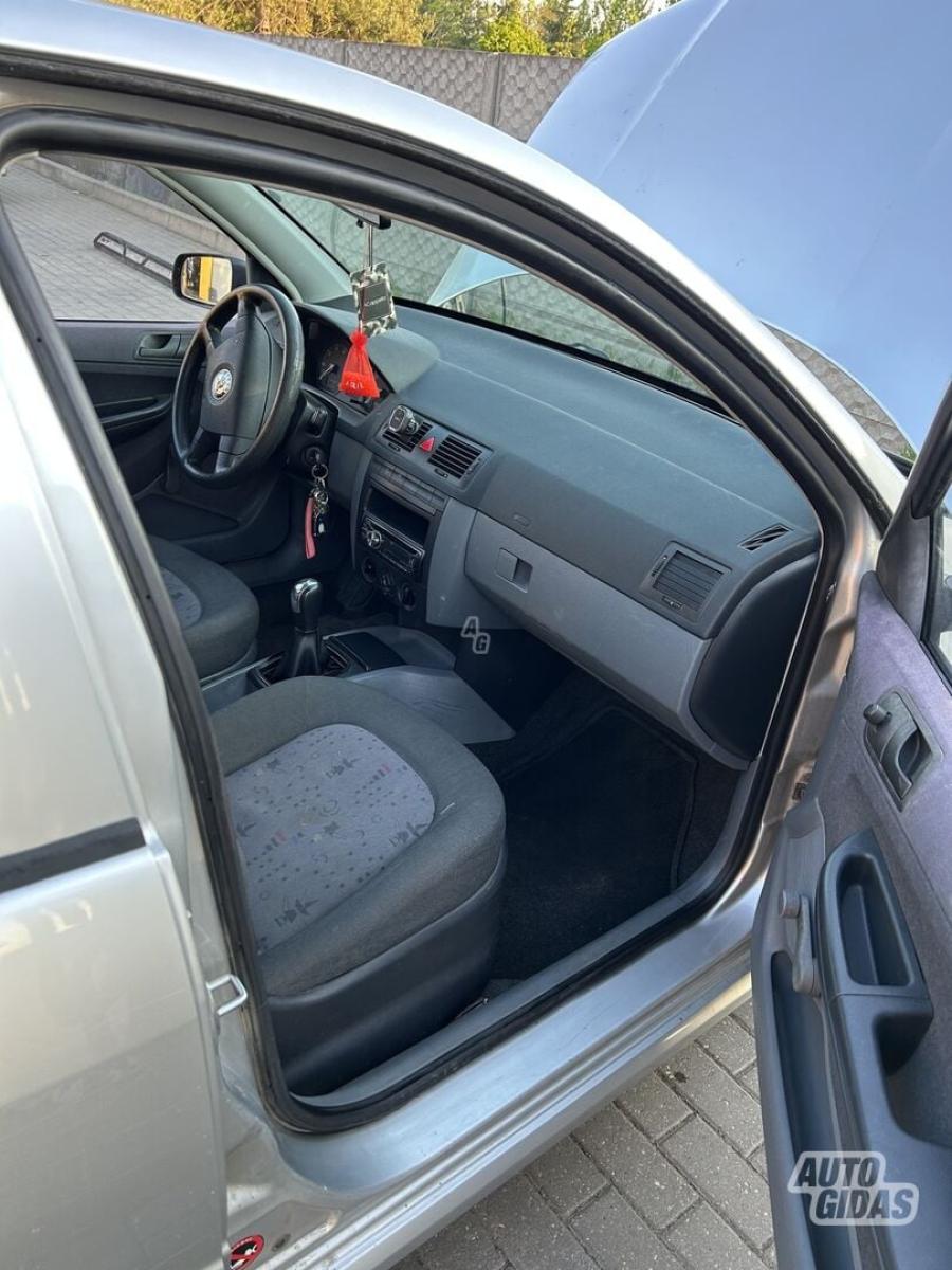 Grey Skoda Fabia 2003 in Kaunas, with an engine capacity of 1.40 L and mileage of 230 thousand km for 600 €, photo 16 on AUTOMOTO.COM.LV