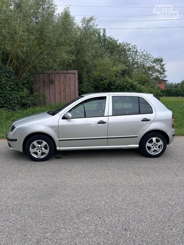 Pelēks Skoda Fabia 2005 Kauņa, ar dzinēja tilpumu 1.40 L un nobraukumu 202 tūkst. km par 1700 €, foto 4 vietnē AUTOMOTO.COM.LV