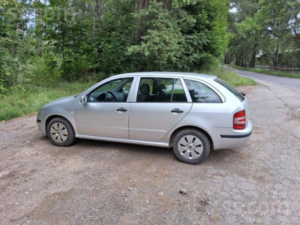 Pelēks Skoda Fabia 2007 Rīga, ar dzinēja tilpumu 1.40 L un nobraukumu 220 tūkst. km par 1600 €, foto 7 vietnē AUTOMOTO.COM.LV