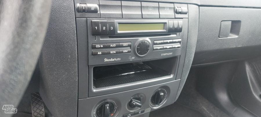 Pelēks Skoda Fabia 2007 Viļņa, ar dzinēja tilpumu 1.40 L un nobraukumu 240 tūkst. km par 1650 €, foto 12 vietnē AUTOMOTO.COM.LV