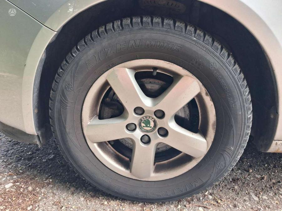 Grey Skoda Fabia 2009 in Siauliai, with an engine capacity of 1.42 L and mileage of 213 thousand km for 2500 €, photo 8 on AUTOMOTO.COM.LV