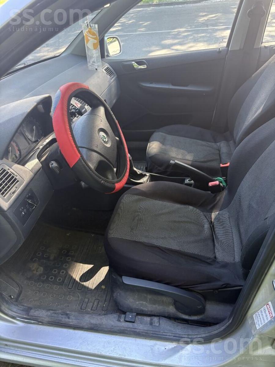 Pelēks Skoda Fabia 2007 Rīga, ar dzinēja tilpumu 1.40 L un nobraukumu 276 tūkst. km par 547 €, foto 14 vietnē AUTOMOTO.COM.LV