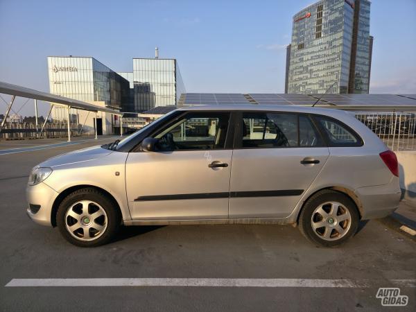 Grey Skoda Fabia 2011 in Vilnius, with an engine capacity of 1.60 L and mileage of 199 thousand km for 2300 €, photo 3 on AUTOMOTO.COM.LV