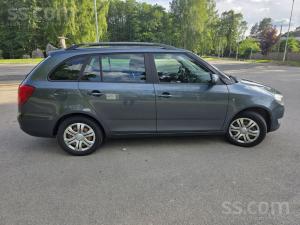 Grey Skoda Fabia 2014 in Riga, with an engine capacity of 1.60 L and mileage of 212 thousand km for 3000 €, photo 6 on AUTOMOTO.COM.LV