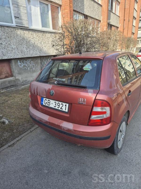 Orange Skoda Fabia 2006 in Riga, with an engine capacity of 1.20 L and mileage of 154 thousand km for 350 €, photo 2 on AUTOMOTO.COM.LV