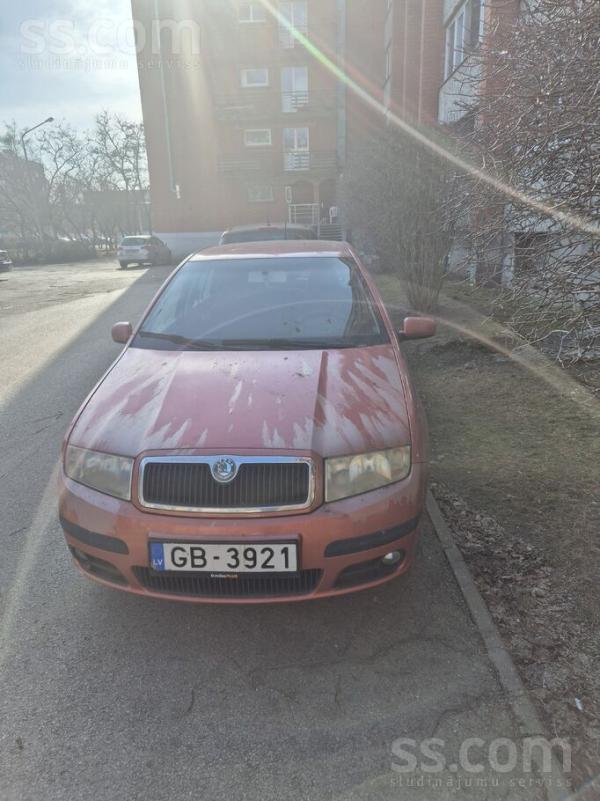 Orange Skoda Fabia 2006 in Riga, with an engine capacity of 1.20 L and mileage of 154 thousand km for 350 €, photo 4 on AUTOMOTO.COM.LV