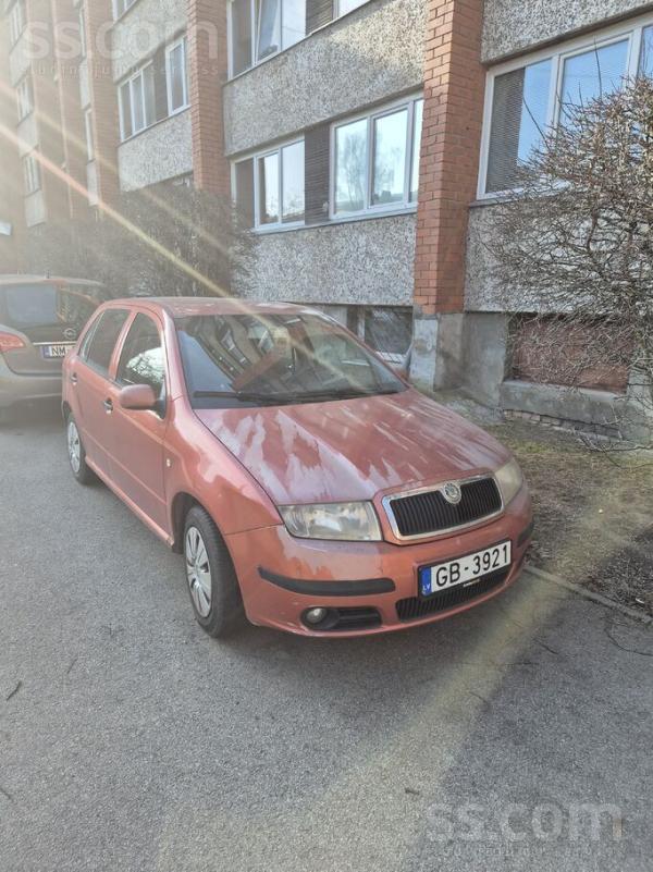 Orange Skoda Fabia 2006 in Riga, with an engine capacity of 1.20 L and mileage of 154 thousand km for 350 €, photo 5 on AUTOMOTO.COM.LV