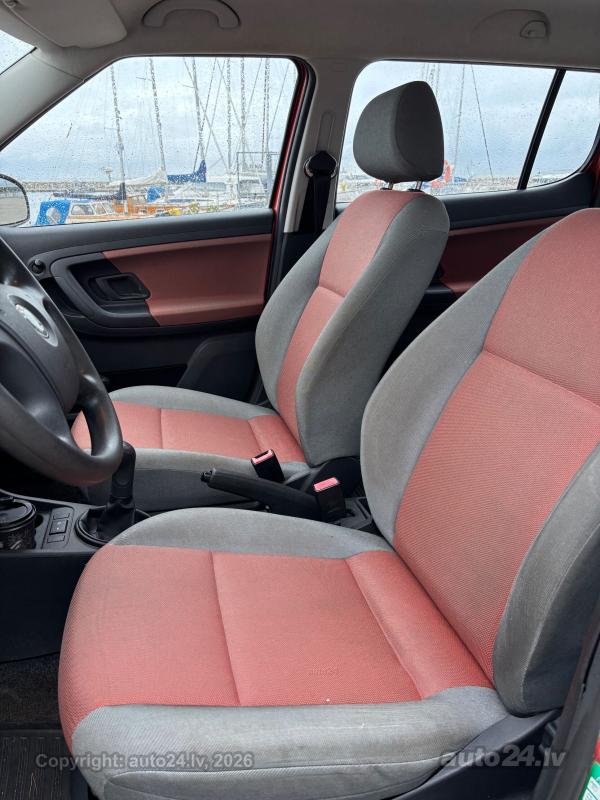 Orange Skoda Fabia 2007 in Tartu, with an engine capacity of 1.20 L and mileage of 84 thousand km for 3190 €, photo 10 on AUTOMOTO.COM.LV