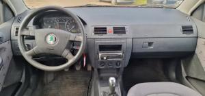 Red Skoda Fabia 2002 in Valmiera, with an engine capacity of 1.40 L and mileage of 144 thousand km for 1300 €, photo 8 on AUTOMOTO.COM.LV