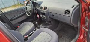 Red Skoda Fabia 2002 in Valmiera, with an engine capacity of 1.40 L and mileage of 144 thousand km for 1300 €, photo 10 on AUTOMOTO.COM.LV