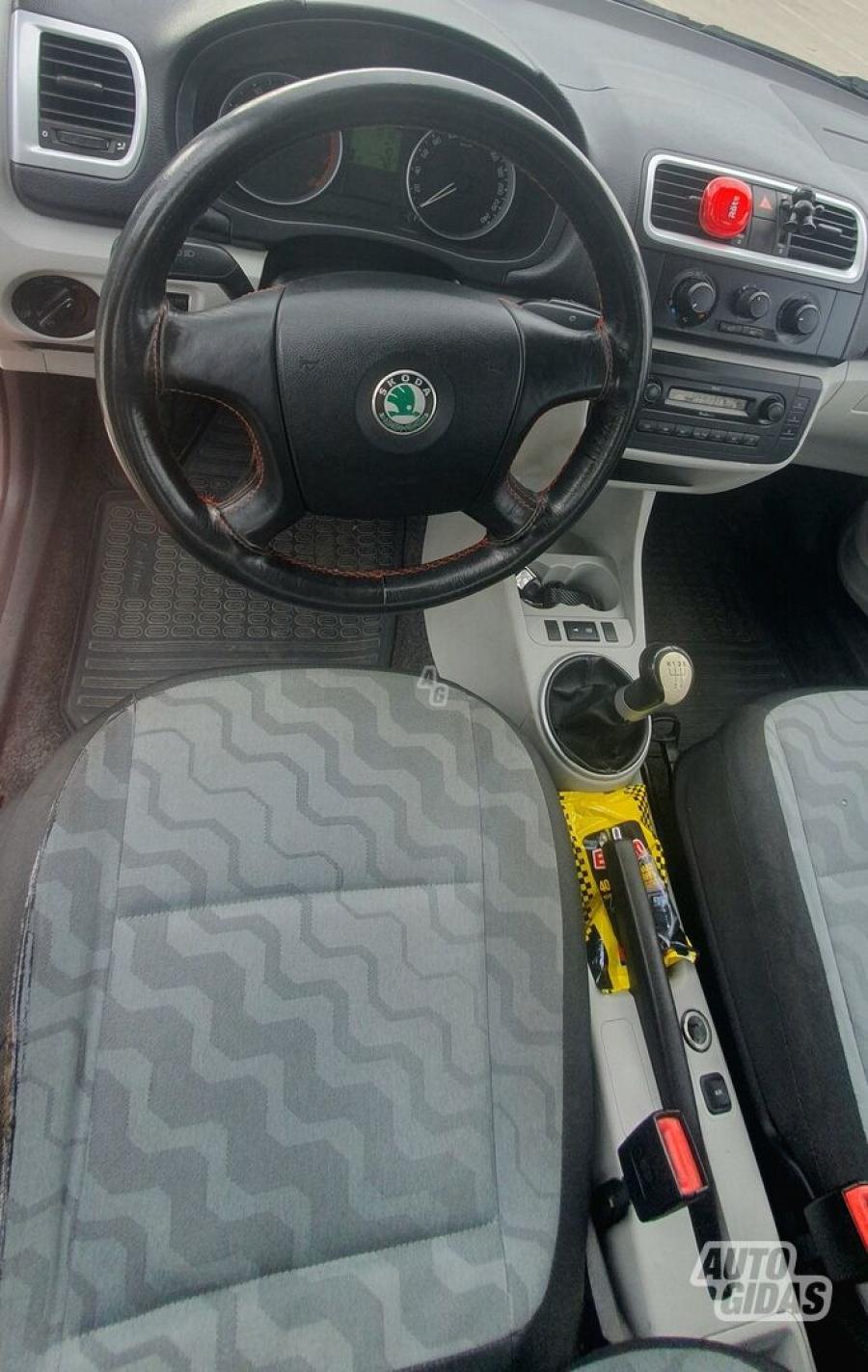 Red Skoda Fabia 2008 in Vilnius, with an engine capacity of 1.40 L and mileage of 200 thousand km for 750 €, photo 8 on AUTOMOTO.COM.LV