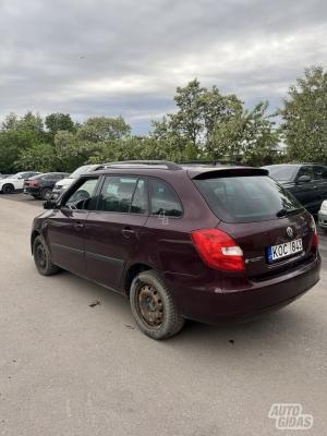 Red Skoda Fabia 2010 in Vilnius, with an engine capacity of 1.20 L and mileage of 231 thousand km for 695 €, photo 5 on AUTOMOTO.COM.LV