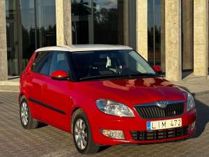 Red Skoda Fabia 2010 in Kaunas, with an engine capacity of 1.60 L and mileage of 255 thousand km for 2999 €, photo 1 on AUTOMOTO.COM.LV