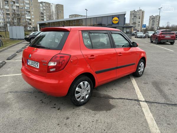 Red Skoda Fabia 2012 in Vilnius, with an engine capacity of 1.20 L and mileage of 190 thousand km for 2600 €, photo 6 on AUTOMOTO.COM.LV
