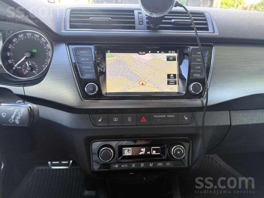 Red Skoda Fabia 2017 in Riga, with an engine capacity of 1.00 L and mileage of 170 thousand km for 8500 €, photo 8 on AUTOMOTO.COM.LV