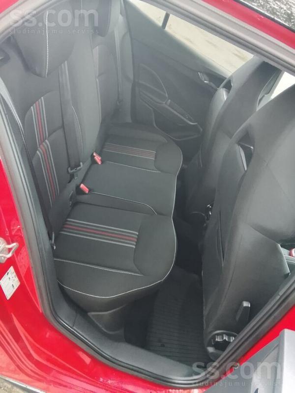 Red Skoda Fabia 2024 in Valmiera, with an engine capacity of 1.00 L and mileage of 61 thousand km for 18500 €, photo 5 on AUTOMOTO.COM.LV