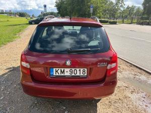 Red Skoda Fabia 2008 in Riga, with an engine capacity of 1.40 L and mileage of 217 thousand km for 1900 €, photo 4 on AUTOMOTO.COM.LV