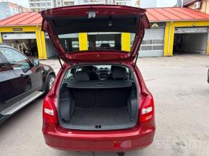 Red Skoda Fabia 2008 in Riga, with an engine capacity of 1.40 L and mileage of 217 thousand km for 1900 €, photo 10 on AUTOMOTO.COM.LV