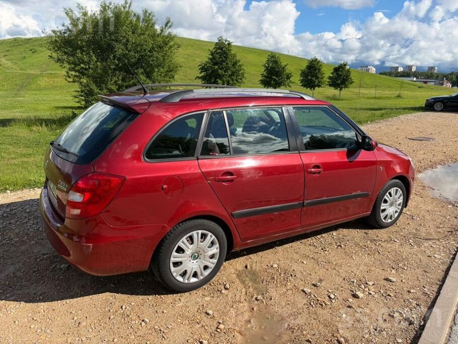 Red Skoda Fabia 2008 in Riga, with an engine capacity of 1.40 L and mileage of 217 thousand km for 1900 €, photo 12 on AUTOMOTO.COM.LV