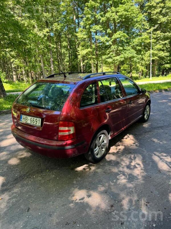 Red Skoda Fabia 2008 in Liepaja, with an engine capacity of 1.20 L and mileage of 179 thousand km for 950 €, photo 3 on AUTOMOTO.COM.LV