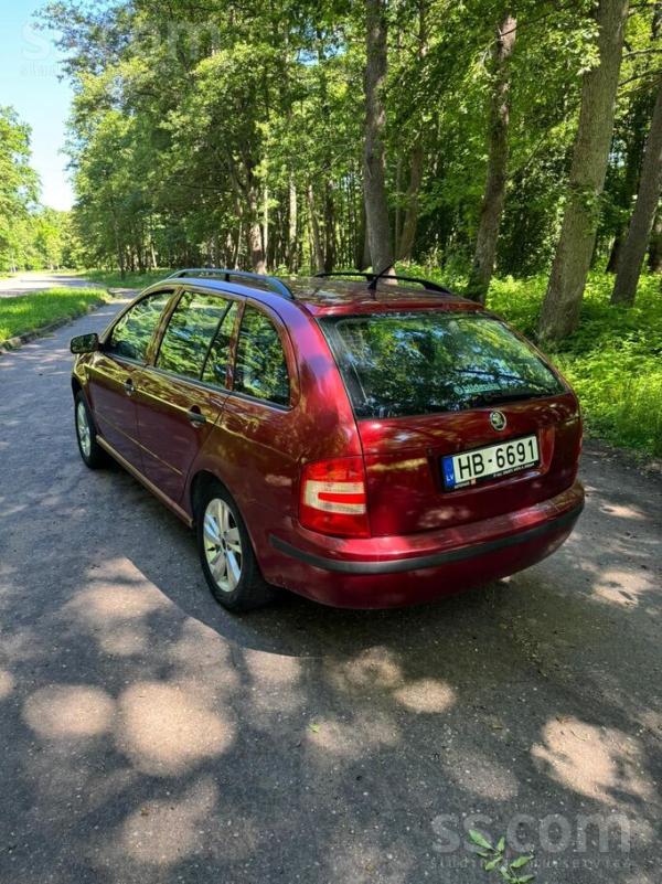 Red Skoda Fabia 2008 in Liepaja, with an engine capacity of 1.20 L and mileage of 179 thousand km for 950 €, photo 4 on AUTOMOTO.COM.LV