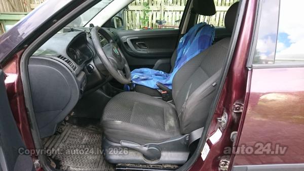 Sarkans Skoda Fabia 2010 Tartu, ar dzinēja tilpumu 1.20 L un nobraukumu 233 tūkst. km par 1800 €, foto 6 vietnē AUTOMOTO.COM.LV