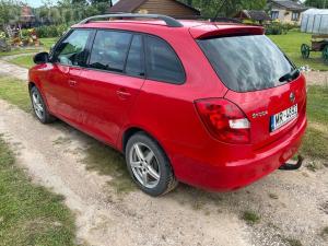 Red Skoda Fabia 2014 in Balvi, with an engine capacity of 1.90 L and mileage of 249 thousand km for 4000 €, photo 8 on AUTOMOTO.COM.LV