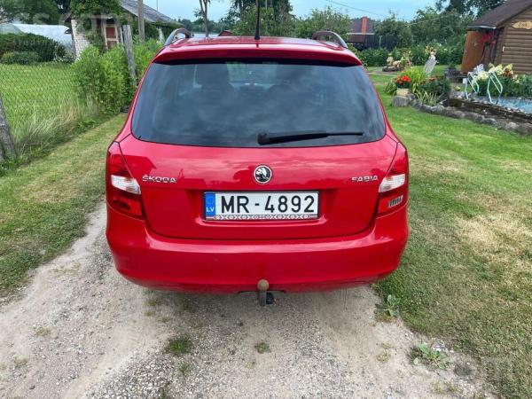 Red Skoda Fabia 2014 in Balvi, with an engine capacity of 1.90 L and mileage of 249 thousand km for 4000 €, photo 9 on AUTOMOTO.COM.LV