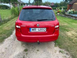 Red Skoda Fabia 2014 in Balvi, with an engine capacity of 1.90 L and mileage of 249 thousand km for 4000 €, photo 9 on AUTOMOTO.COM.LV