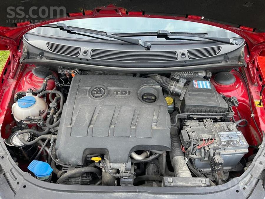 Red Skoda Fabia 2014 in Balvi, with an engine capacity of 1.90 L and mileage of 249 thousand km for 4000 €, photo 20 on AUTOMOTO.COM.LV