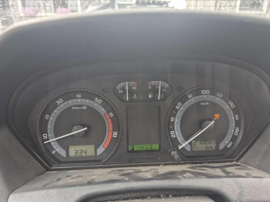 Yellow Skoda Fabia 2004 in Kaunas, with an engine capacity of 1.39 L and mileage of 270 thousand km for 499 €, photo 9 on AUTOMOTO.COM.LV