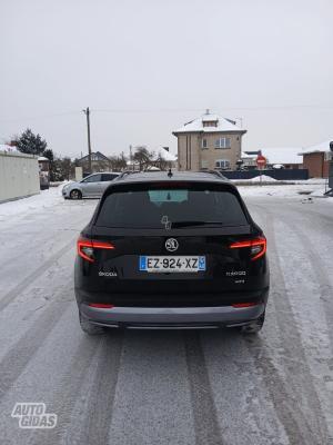 Black Skoda Karoq 2018 in Taurage, with an engine capacity of 2.00 L and mileage of 265 thousand km for 11950 €, photo 5 on AUTOMOTO.COM.LV